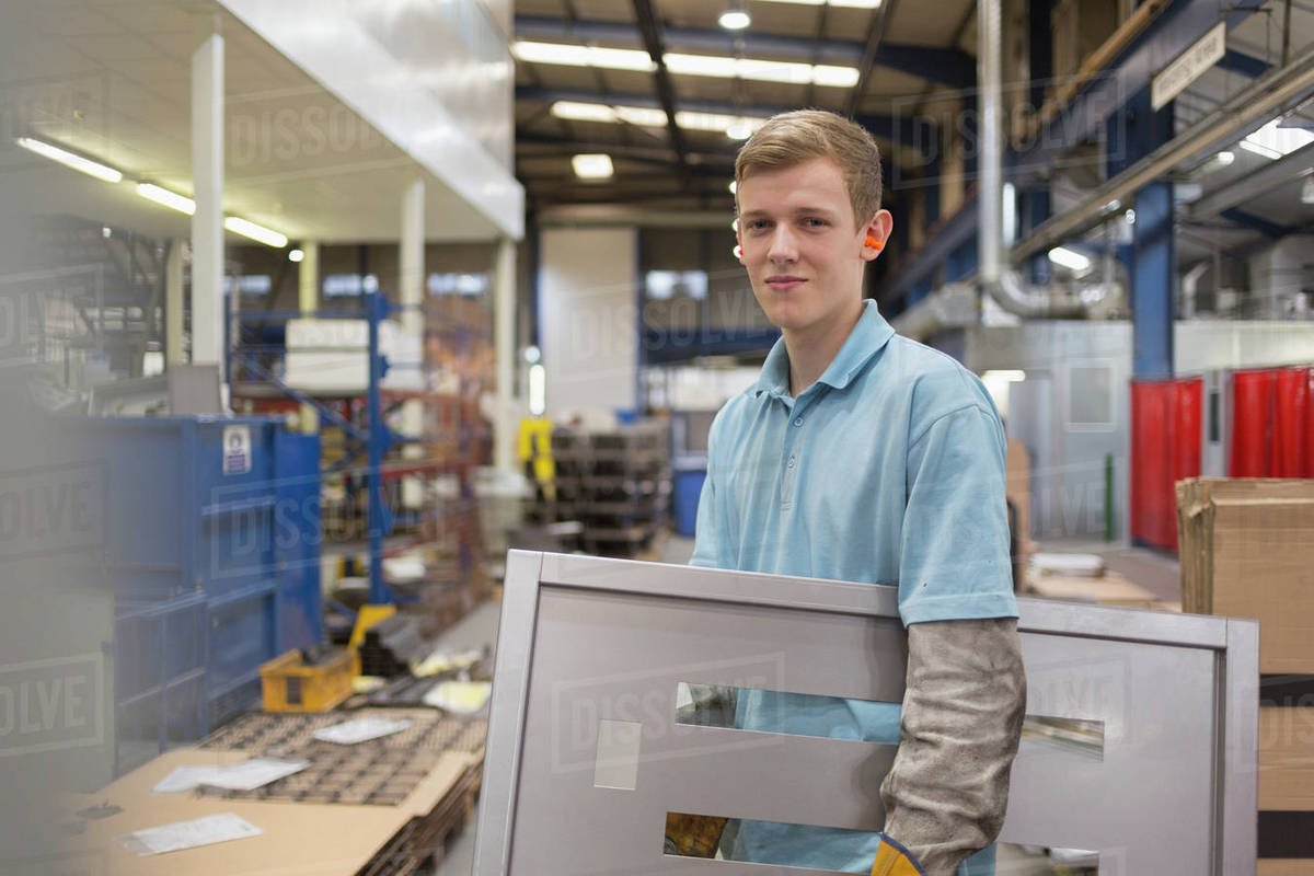 Portrait worker carrying piece in steel factory - Royalty-free Stock ...
