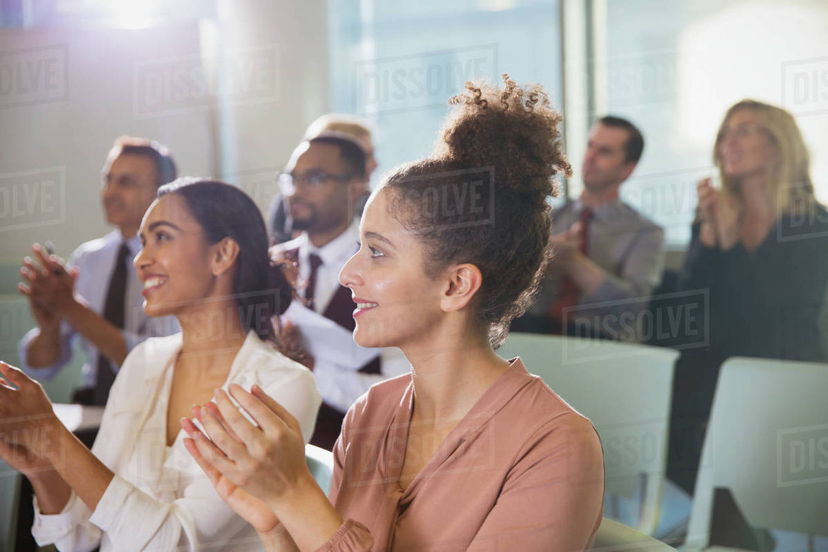 Businesswomen clapping in conference audience - Royalty-free Stock ...