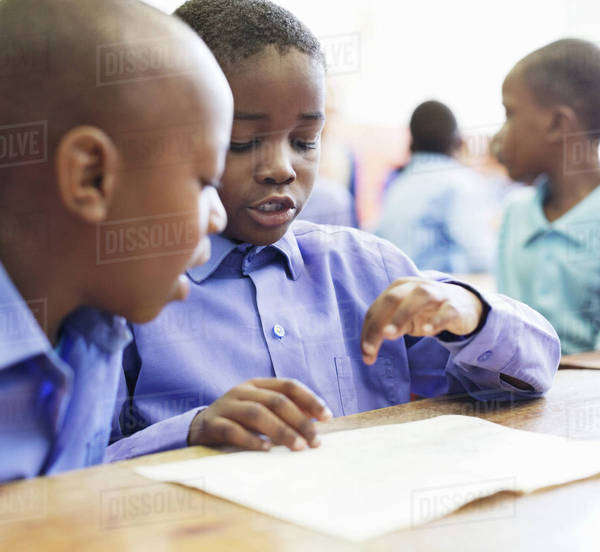 Students talking in class - Stock Photo - Dissolve