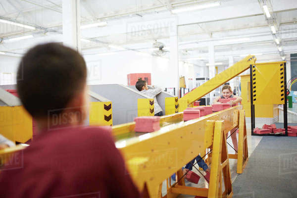Kids playing at interactive construction exhibit in science center ...
