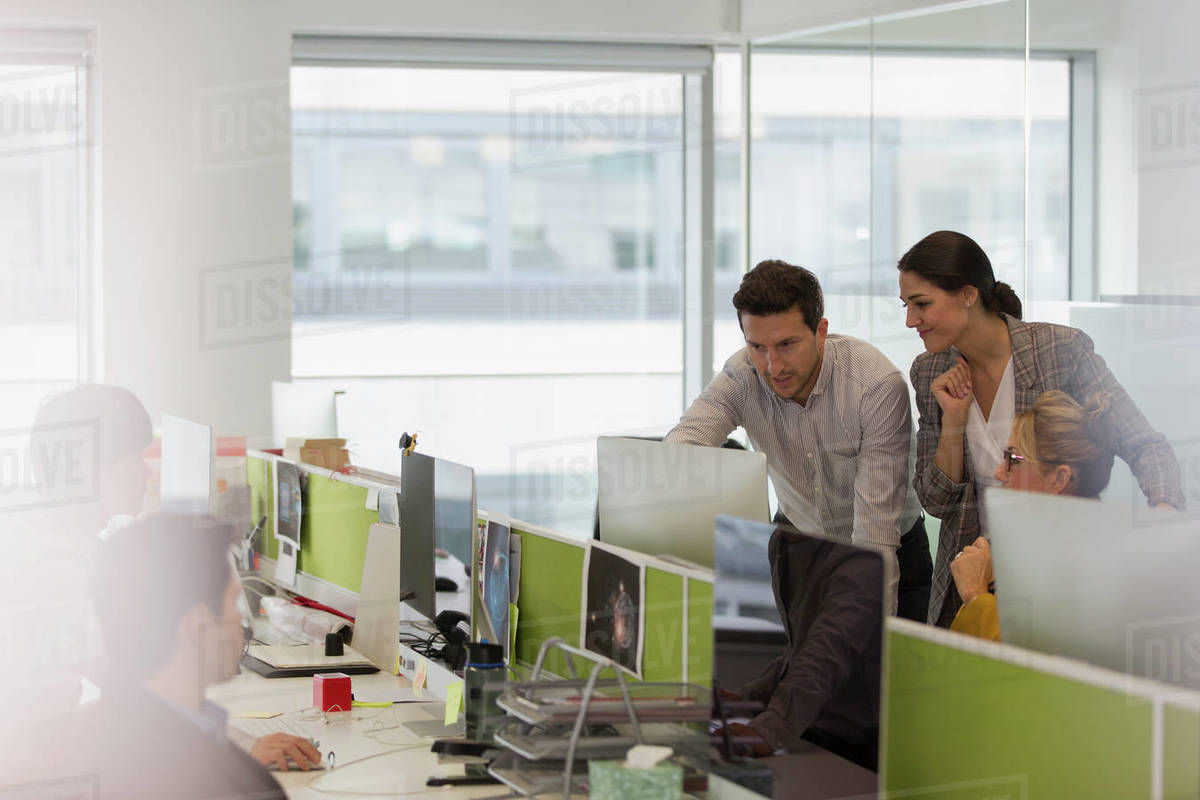 Business people talking, meeting at computer in office - Stock Photo ...