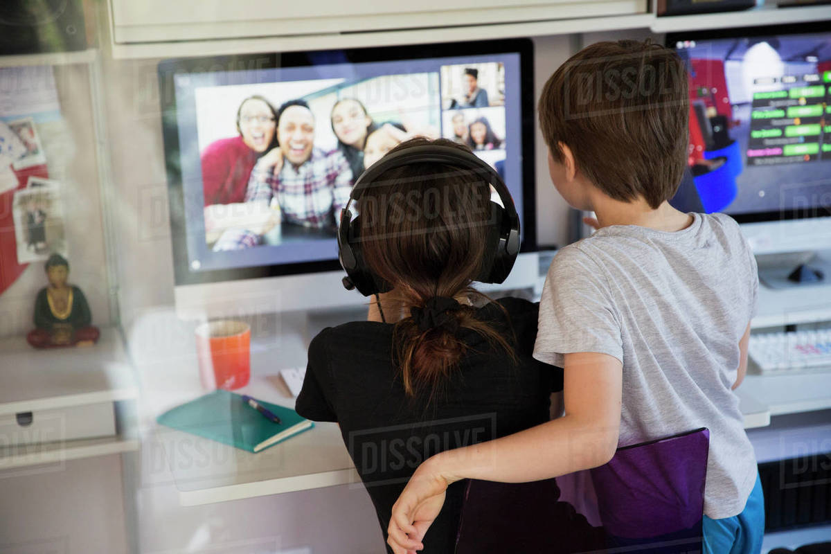 Kids video conferencing with friends on computer screen - Stock Photo ...