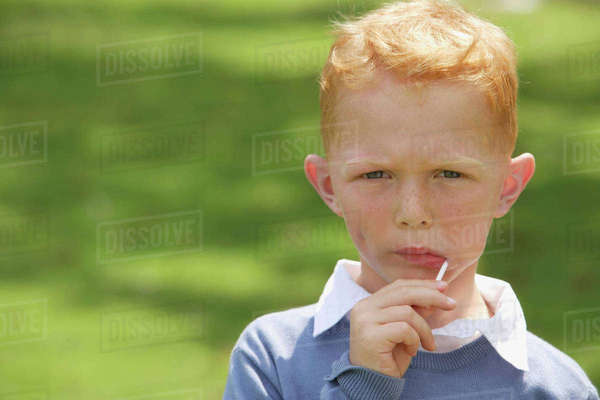 Little boy with sucker - Royalty-free Stock Photo | Dissolve