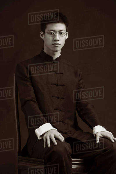 Man looking at camera, studio portrait - Royalty-free Stock Photo ...