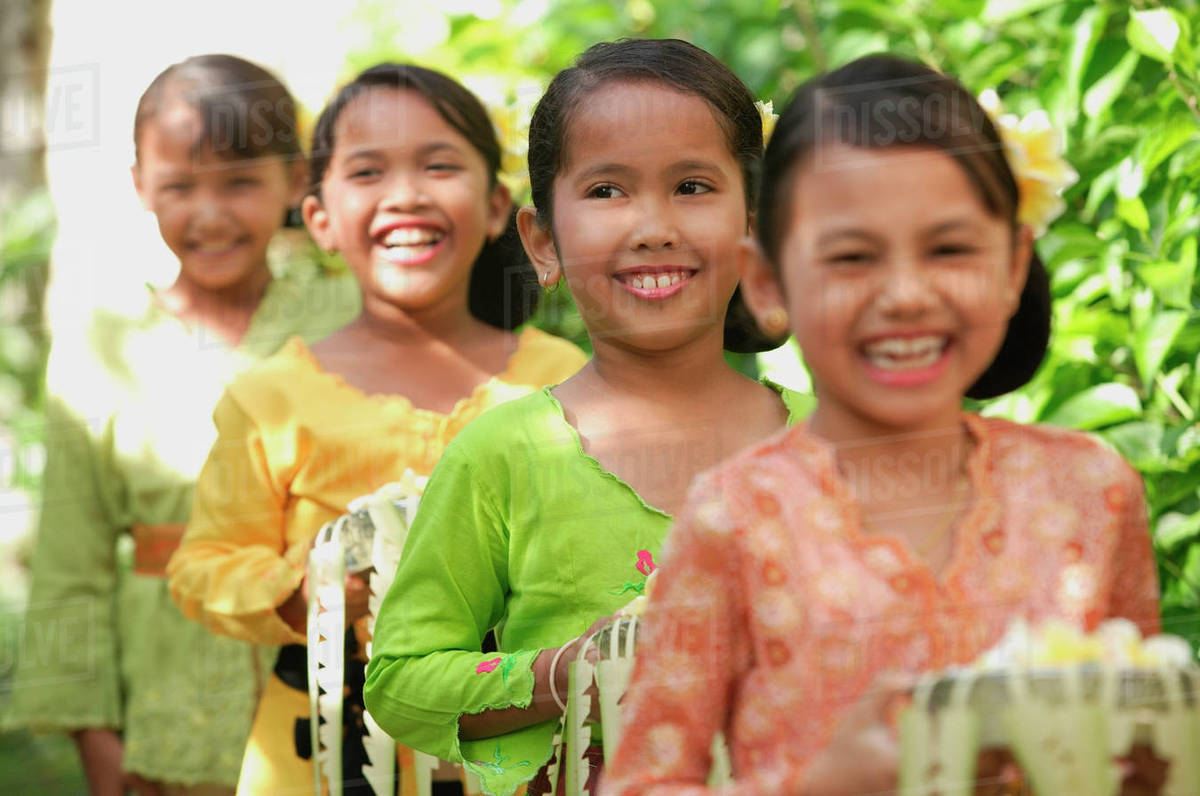 Balinese children laughing - Royalty-free Stock Photo | Dissolve