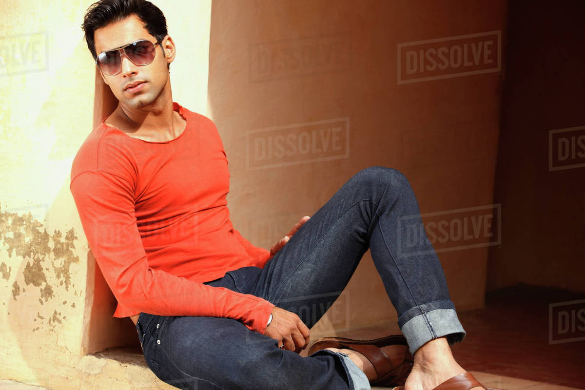 Man reclining in sunshine - Royalty-free Stock Photo | Dissolve