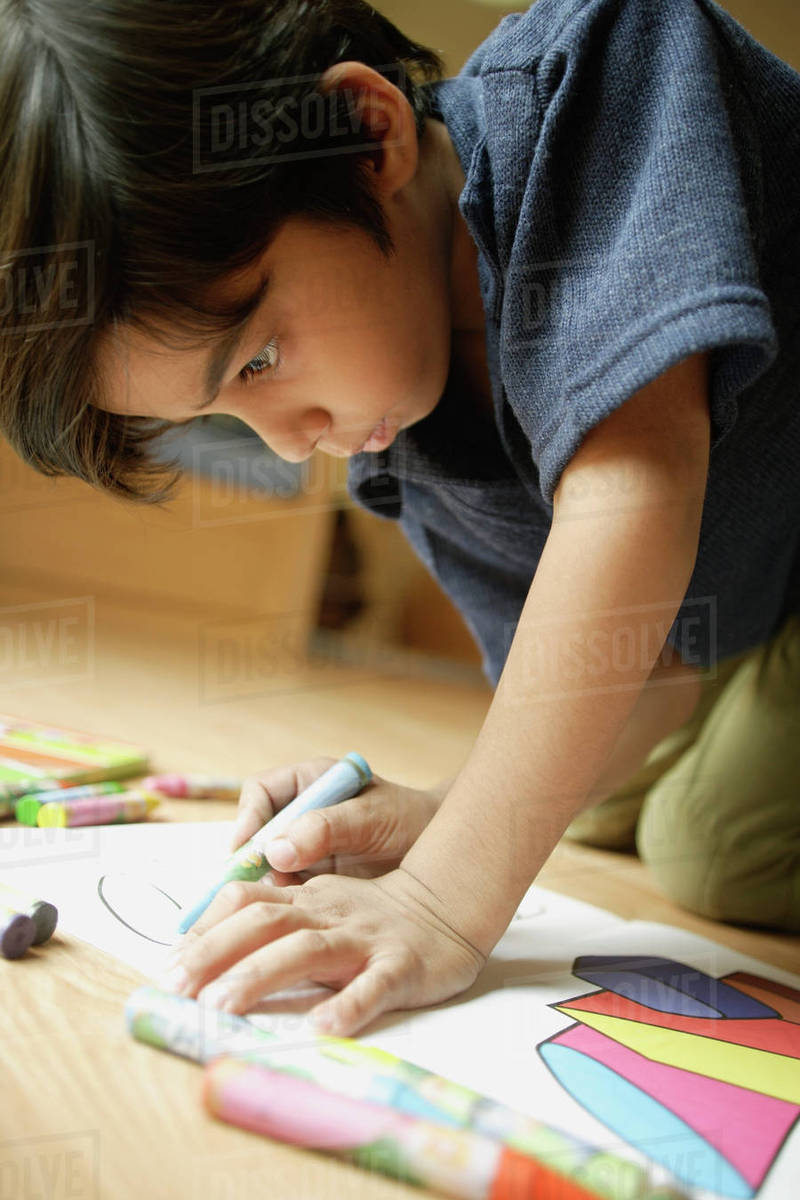 Little boy coloring - Royalty-free Stock Photo | Dissolve
