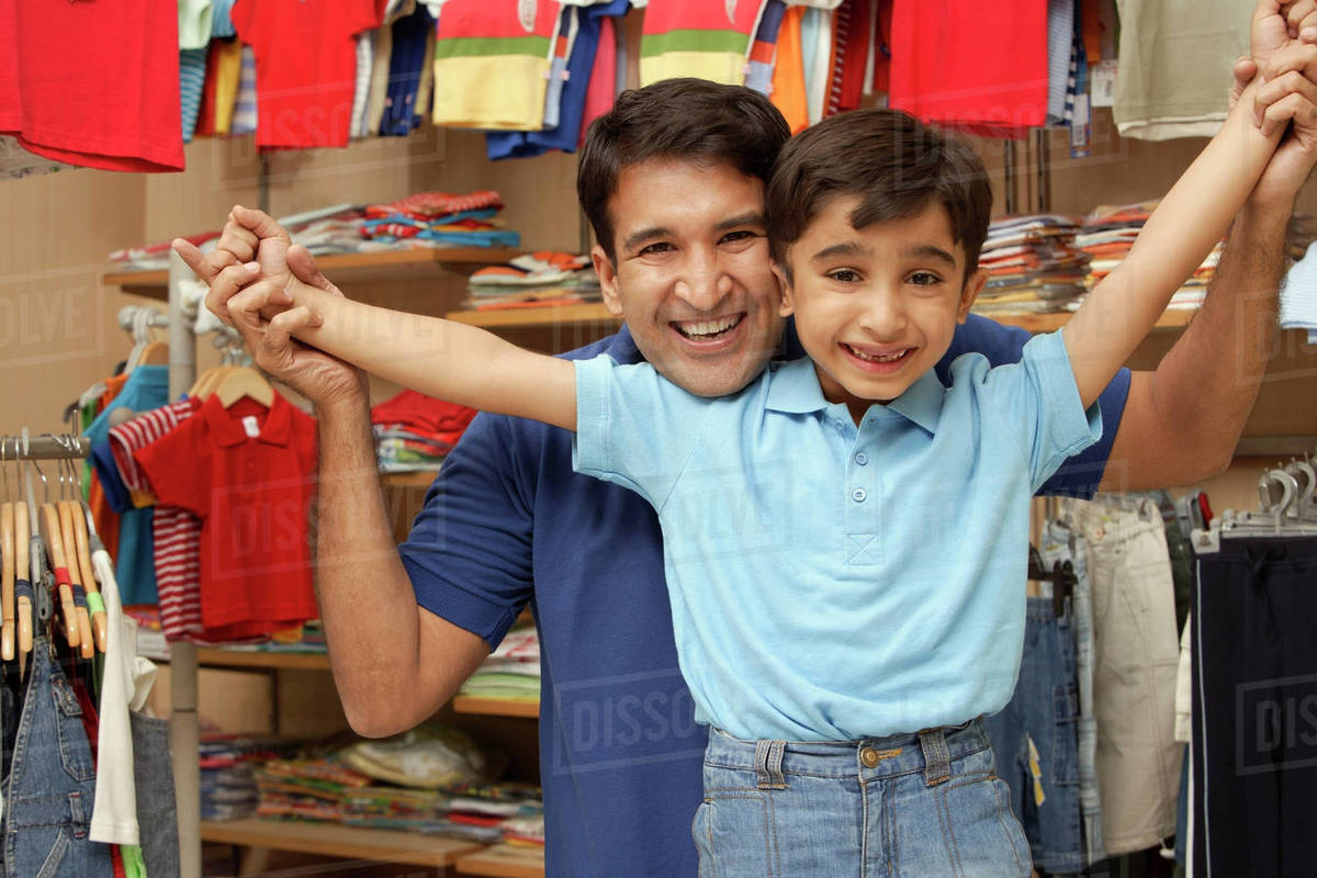 Father and son in shop - Royalty-free Stock Photo | Dissolve