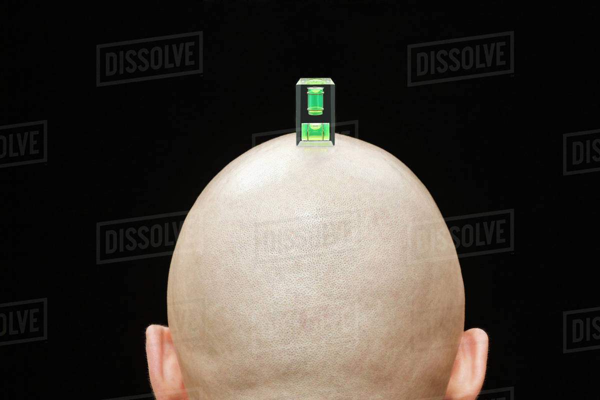 A camera spirit level on the head of a man, rear view - Stock Photo ...