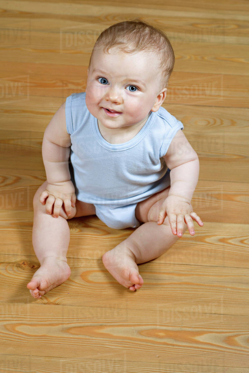 Portrait of a baby sitting - Royalty-free Stock Photo | Dissolve