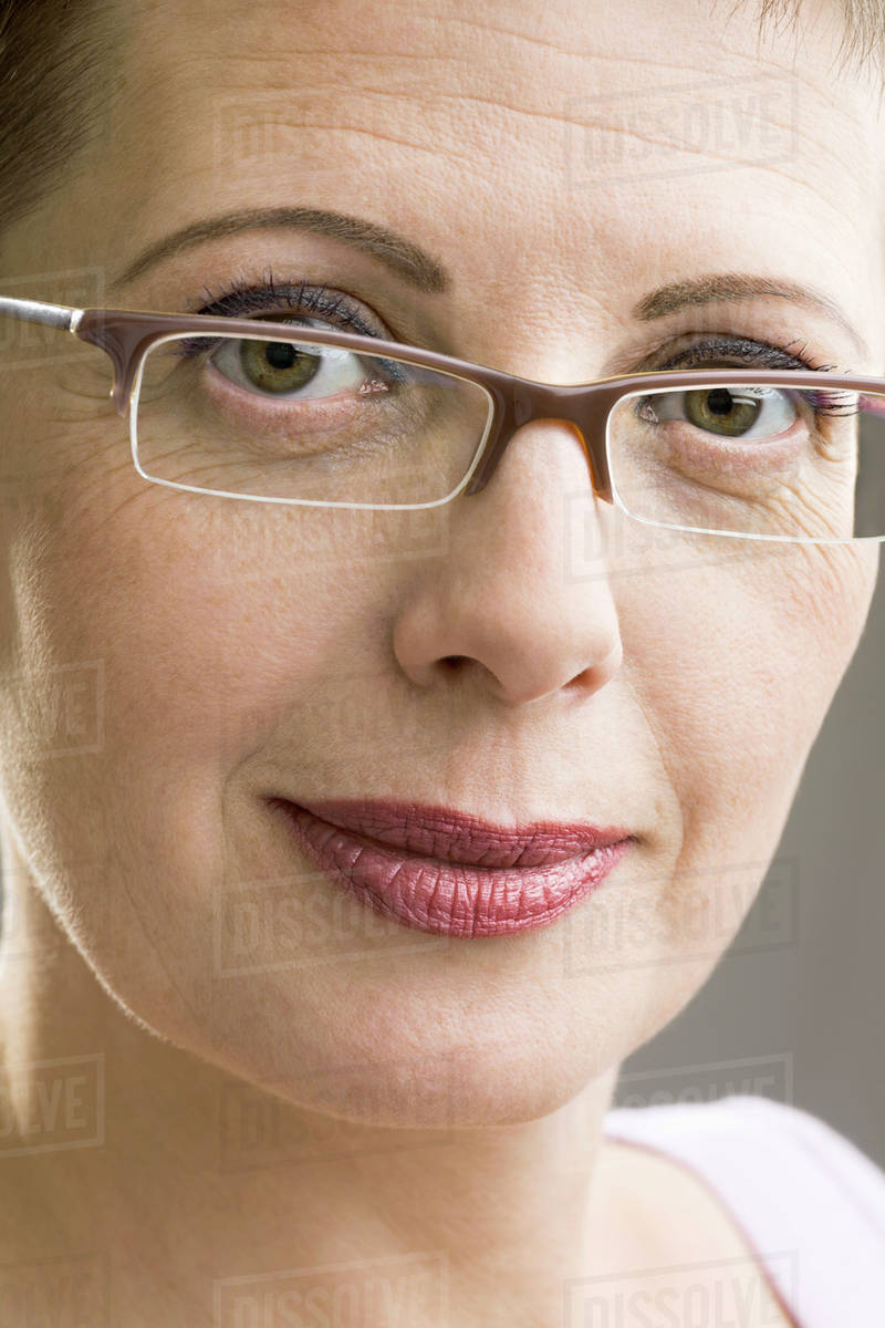 Portrait of woman with glasses - Royalty-free Stock Photo | Dissolve