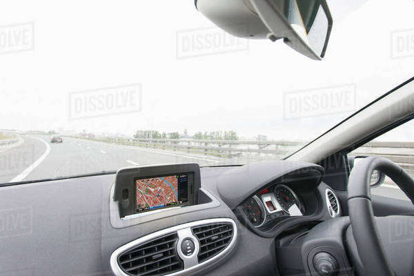 Car interior with GPS on dashboard - Royalty-free Stock Photo | Dissolve