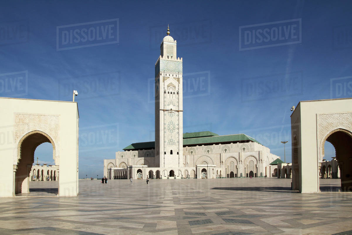 Hassan II Mosque against blue sky - Stock Photo - Dissolve