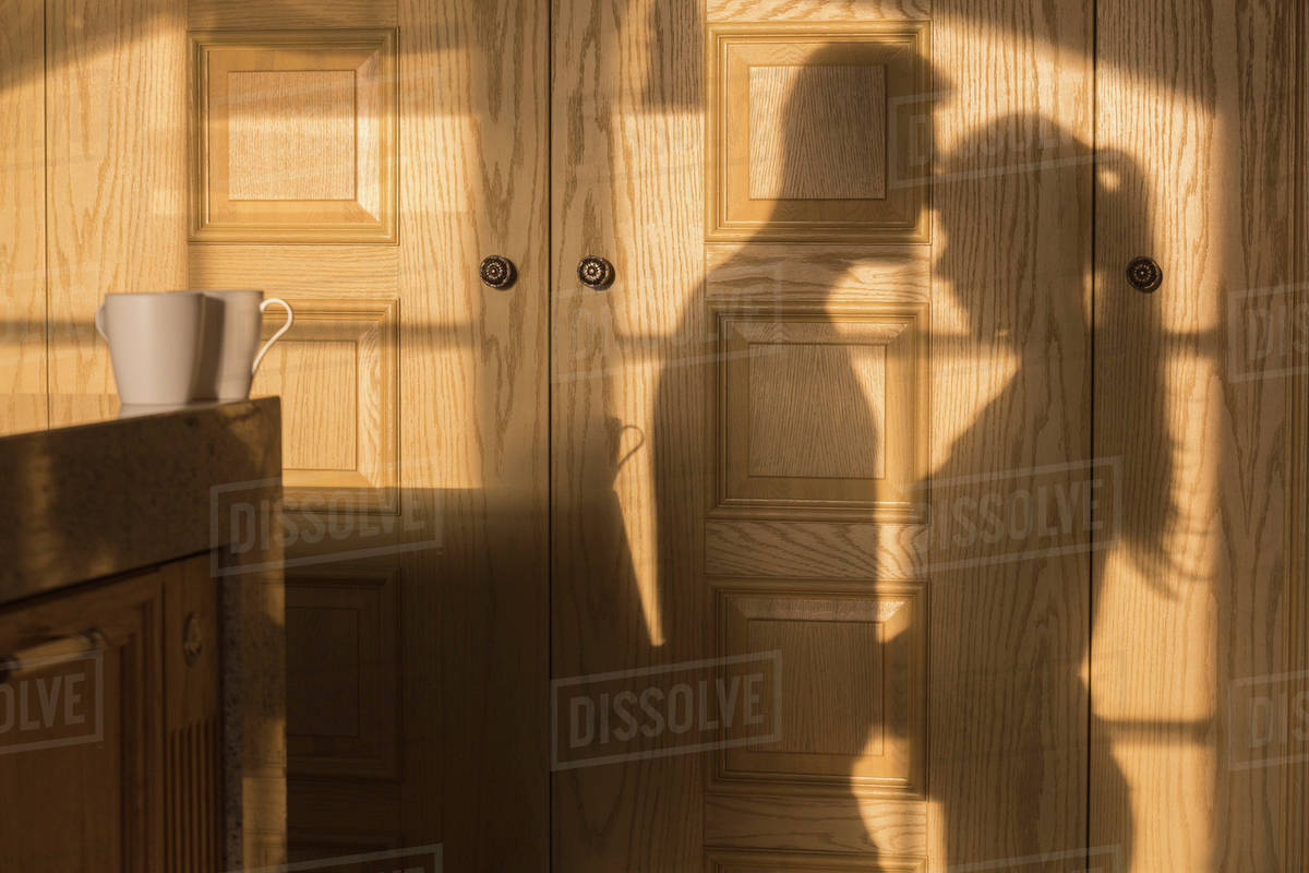 Shadow of romantic couple on wooden wall - Royalty-free Stock Photo ...