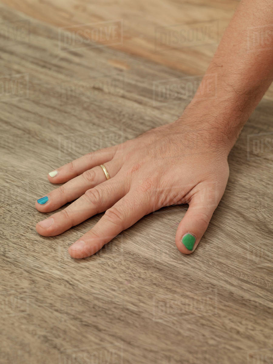 Detail of the hand of a man with painted nails - Royalty-free Stock ...