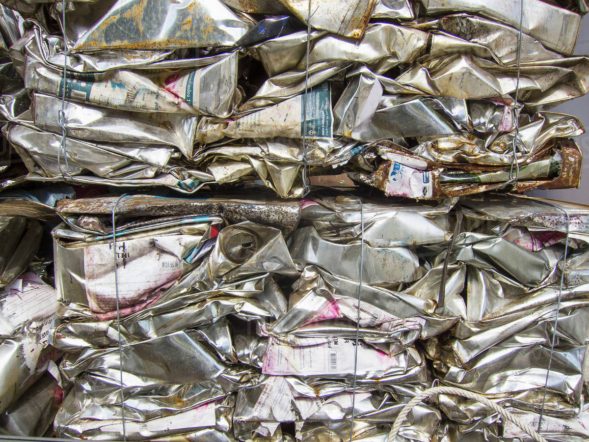 Full frame shot of crushed metal containers at garbage dump - Royalty ...