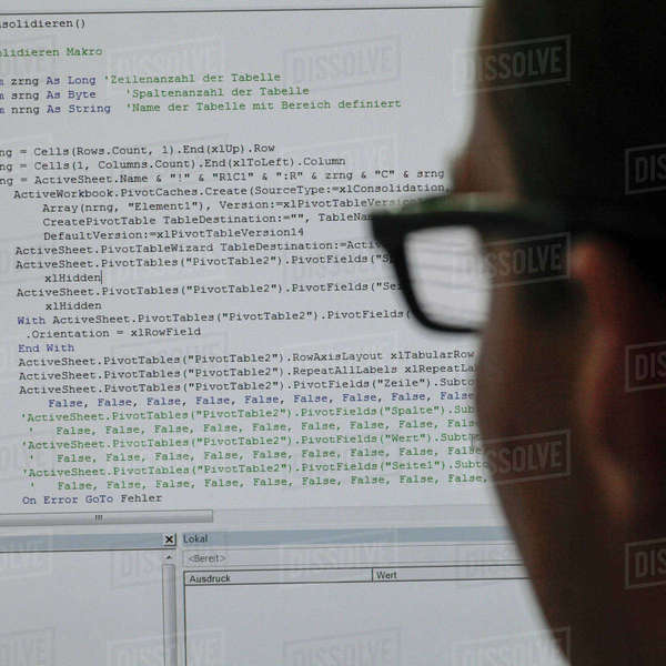 Close-up of person reading programming code on computer screen - Stock ...