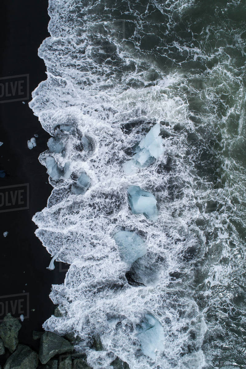 Aerial view of ice on shore, Iceland - Royalty-free Stock Photo | Dissolve