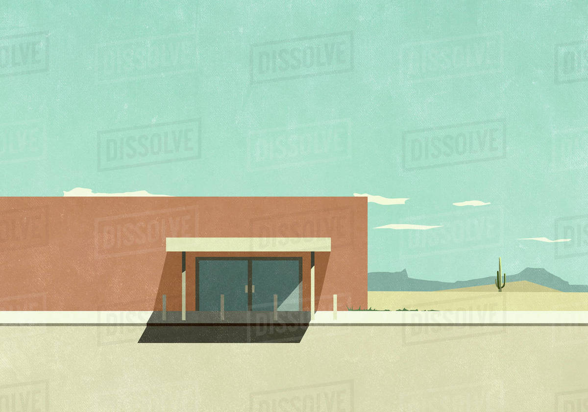 Warehouse building in sunny desert landscape - Stock Photo - Dissolve