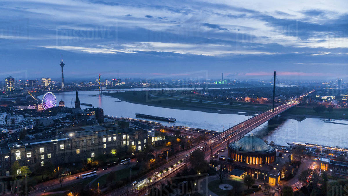 Duesseldorf cityscape illuminated at dusk, North Rhine-Westphalia ...
