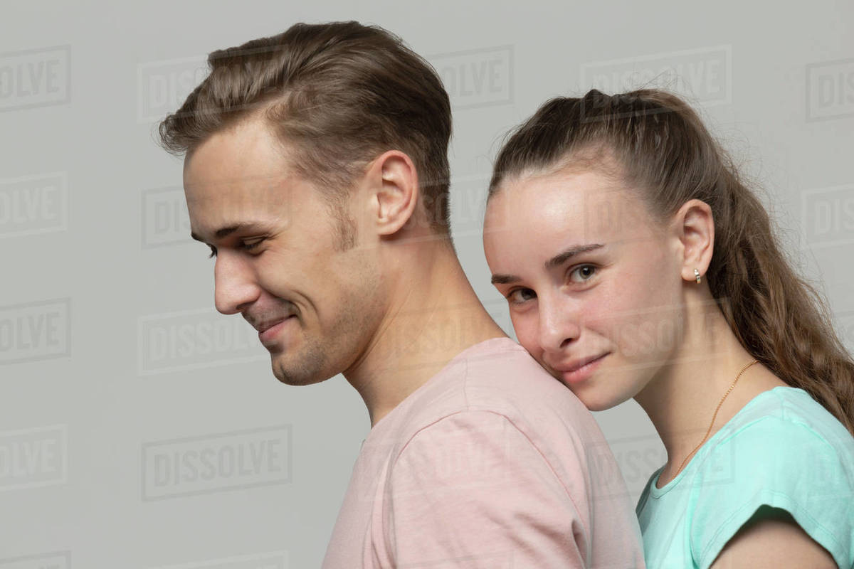 Studio portrait confident young couple - Royalty-free Stock Photo ...