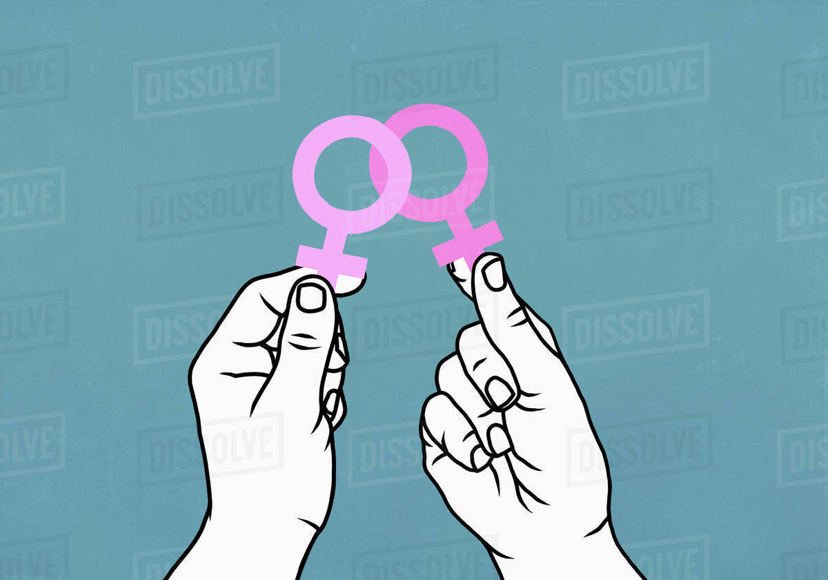 Hands holding pink female symbols - Royalty-free Stock Photo | Dissolve
