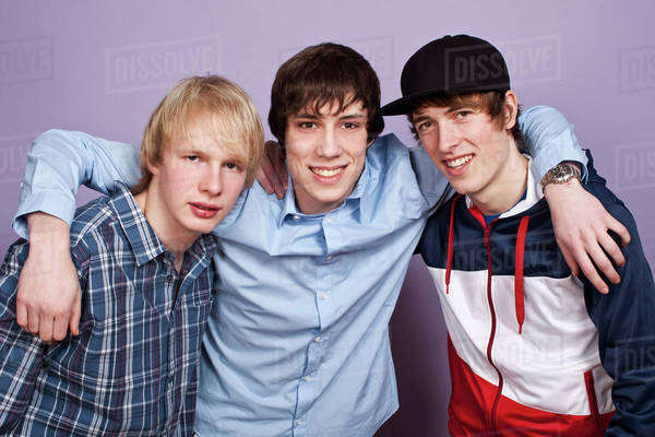 Three teenage boys, portrait, studio shot - Royalty-free Stock Photo ...