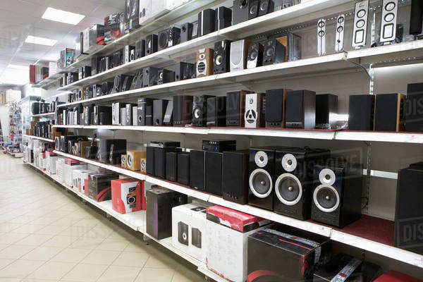 Speakers on display in an electronics store - Stock Photo - Dissolve