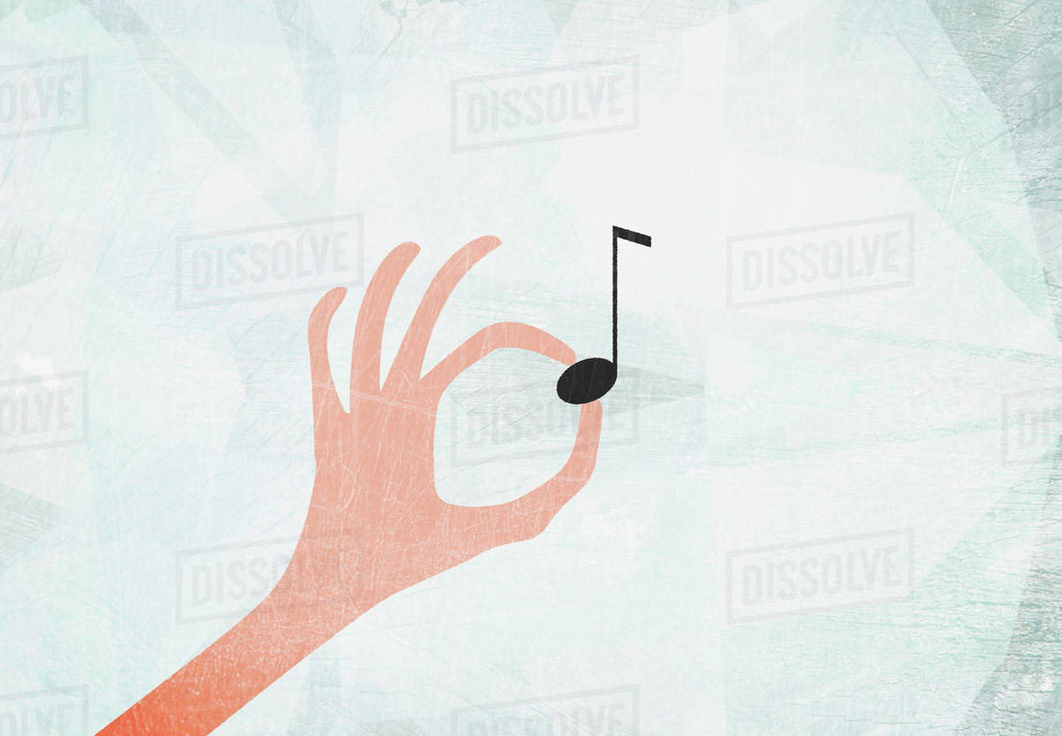 A hand holding a musical note - Stock Photo - Dissolve